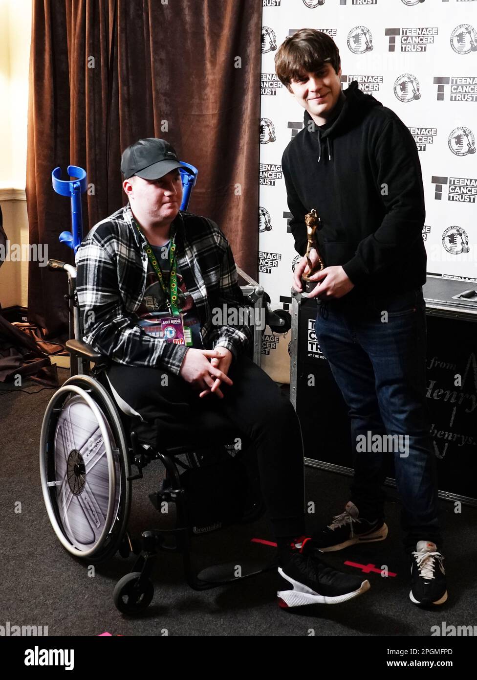 Daniel Bugg, 15, (left) presents an award to Jake Bugg ahead of his ...