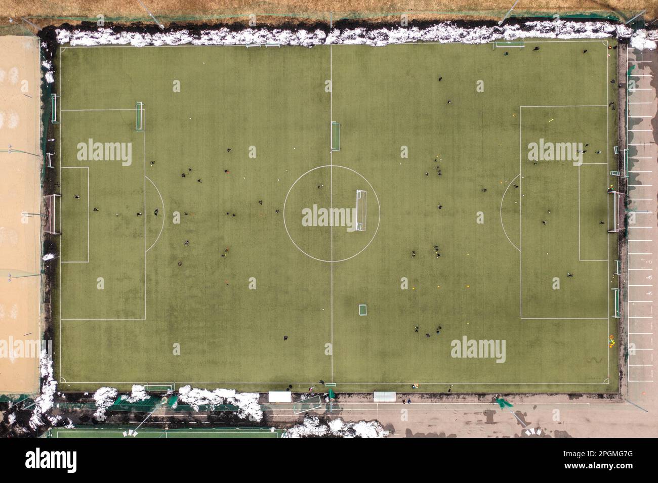 Drone photography of football game practice in soccer field during ...