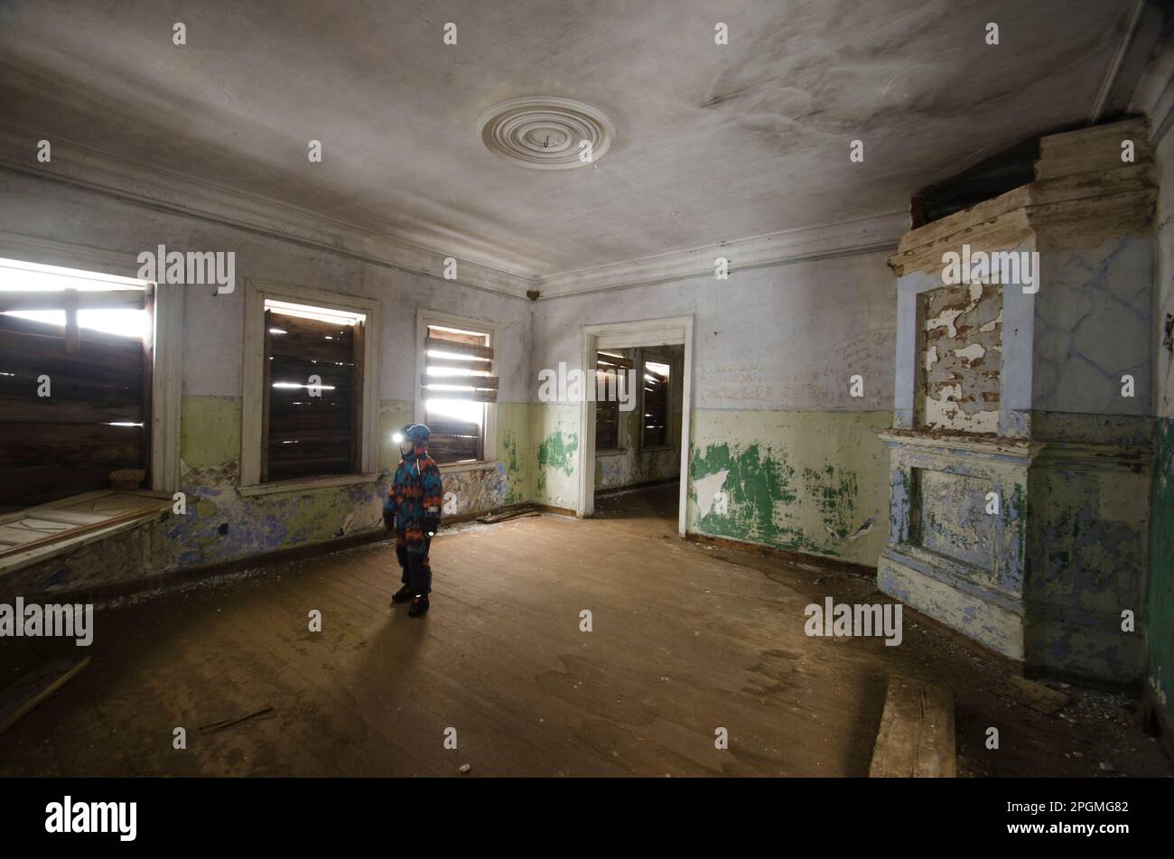 Little boy in an abandoned house Stock Photo - Alamy