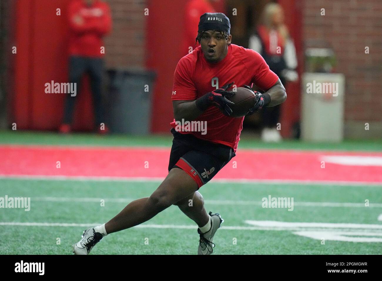 Utah football running back Tavion Thomas runs a drill during the school ...