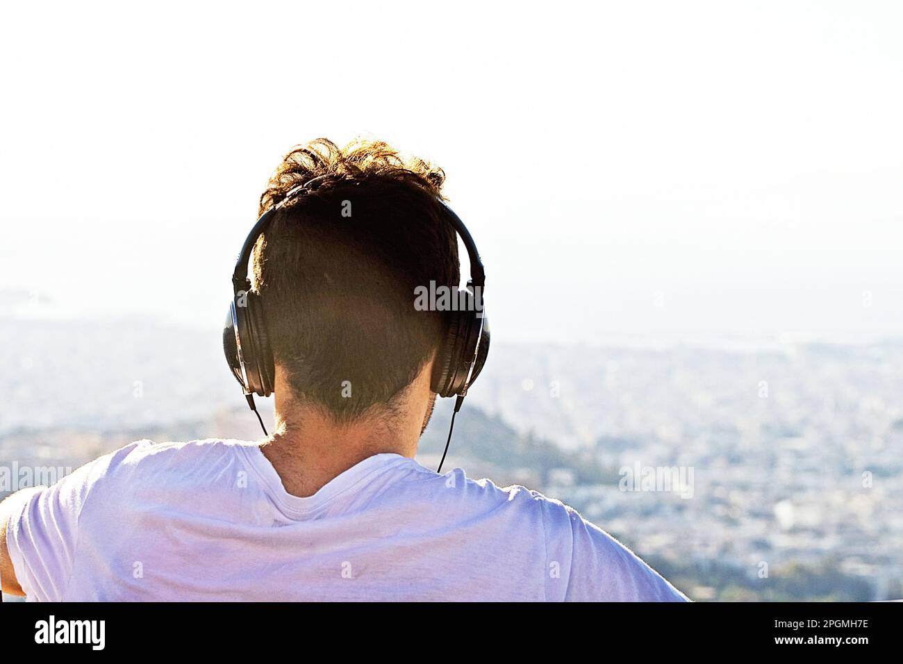Headphones back head hi-res stock photography and images - Alamy