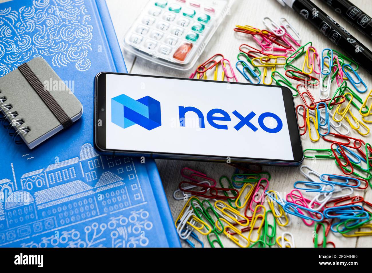 In this photo illustration a Nexo logo seen displayed on a smartphone ...