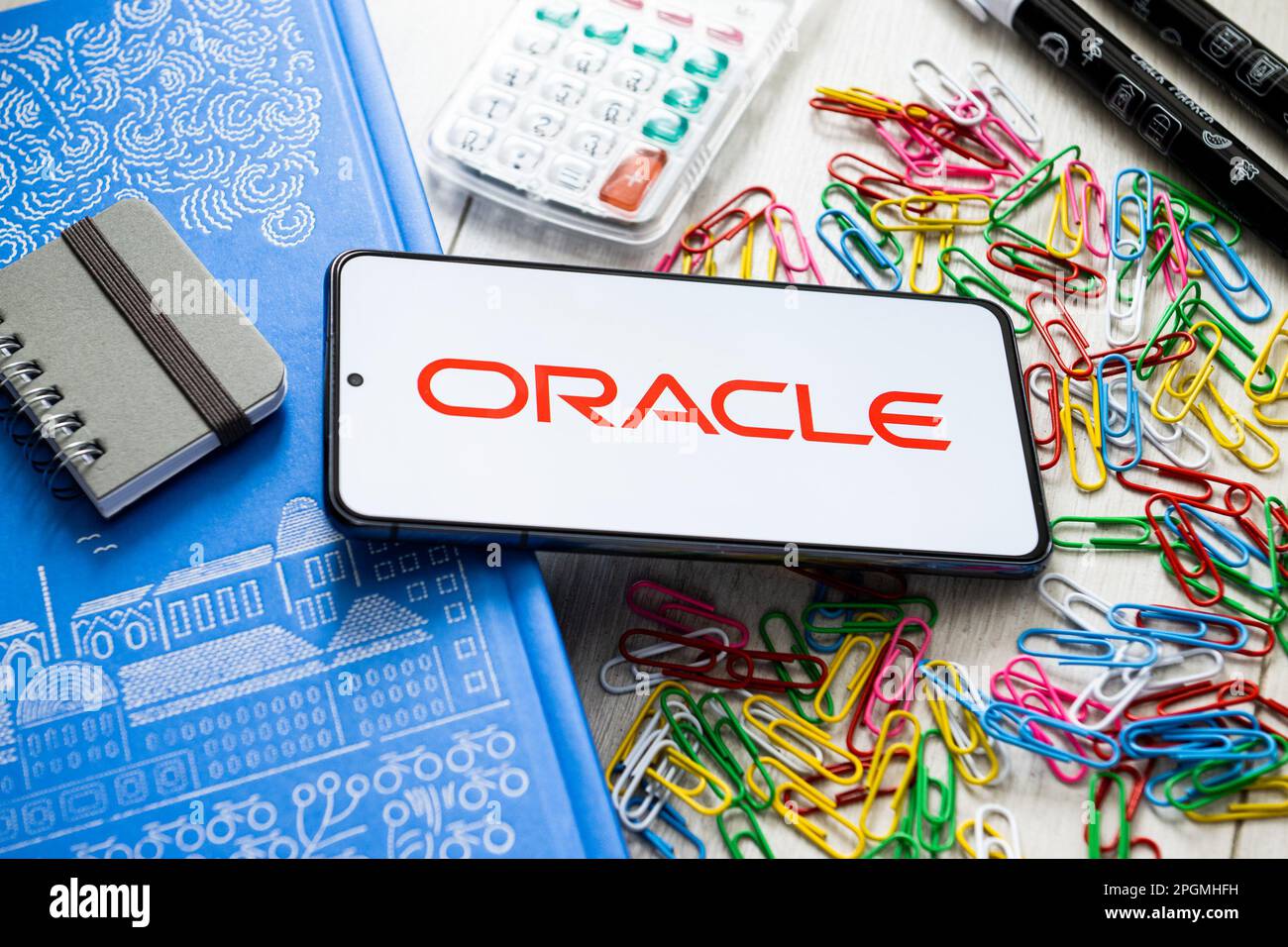 In this photo illustration an Oracle logo seen displayed on a ...