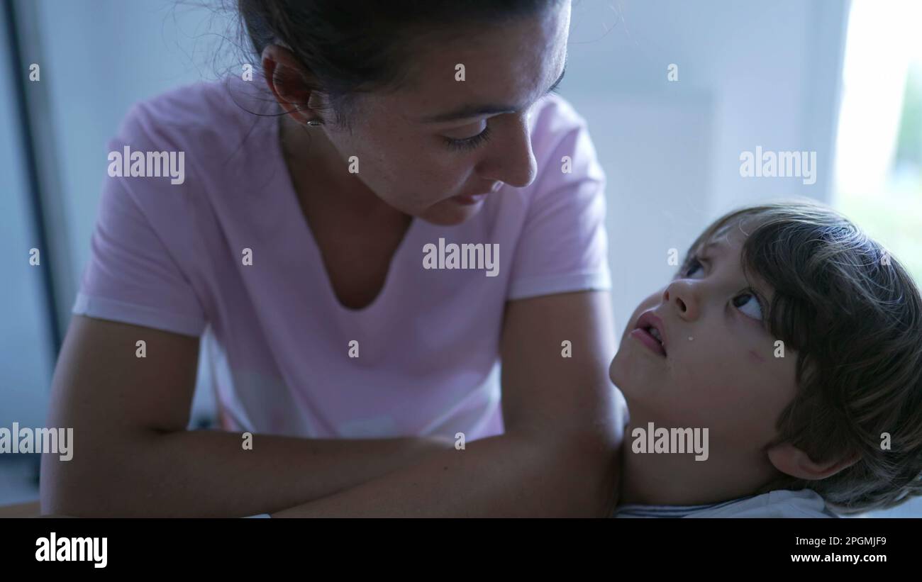 Mother educating child misbehavior. Small boy feeling guilty emotion ...