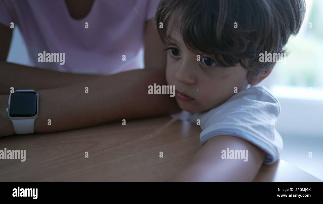 Mother educating child misbehavior. Small boy feeling guilty emotion ...