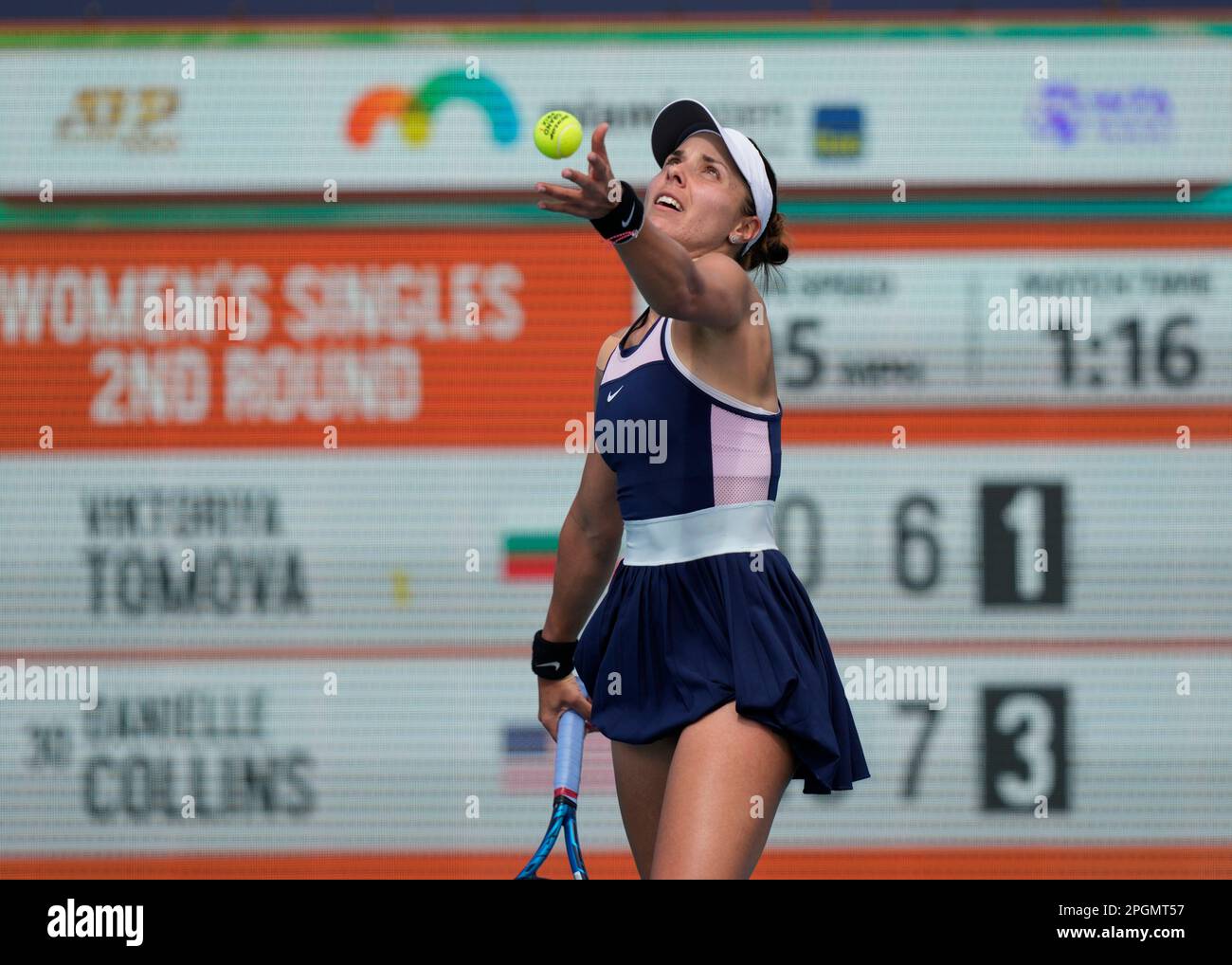 Viktoriya Tomova of Bulgaria serves to Danielle Collins during the ...