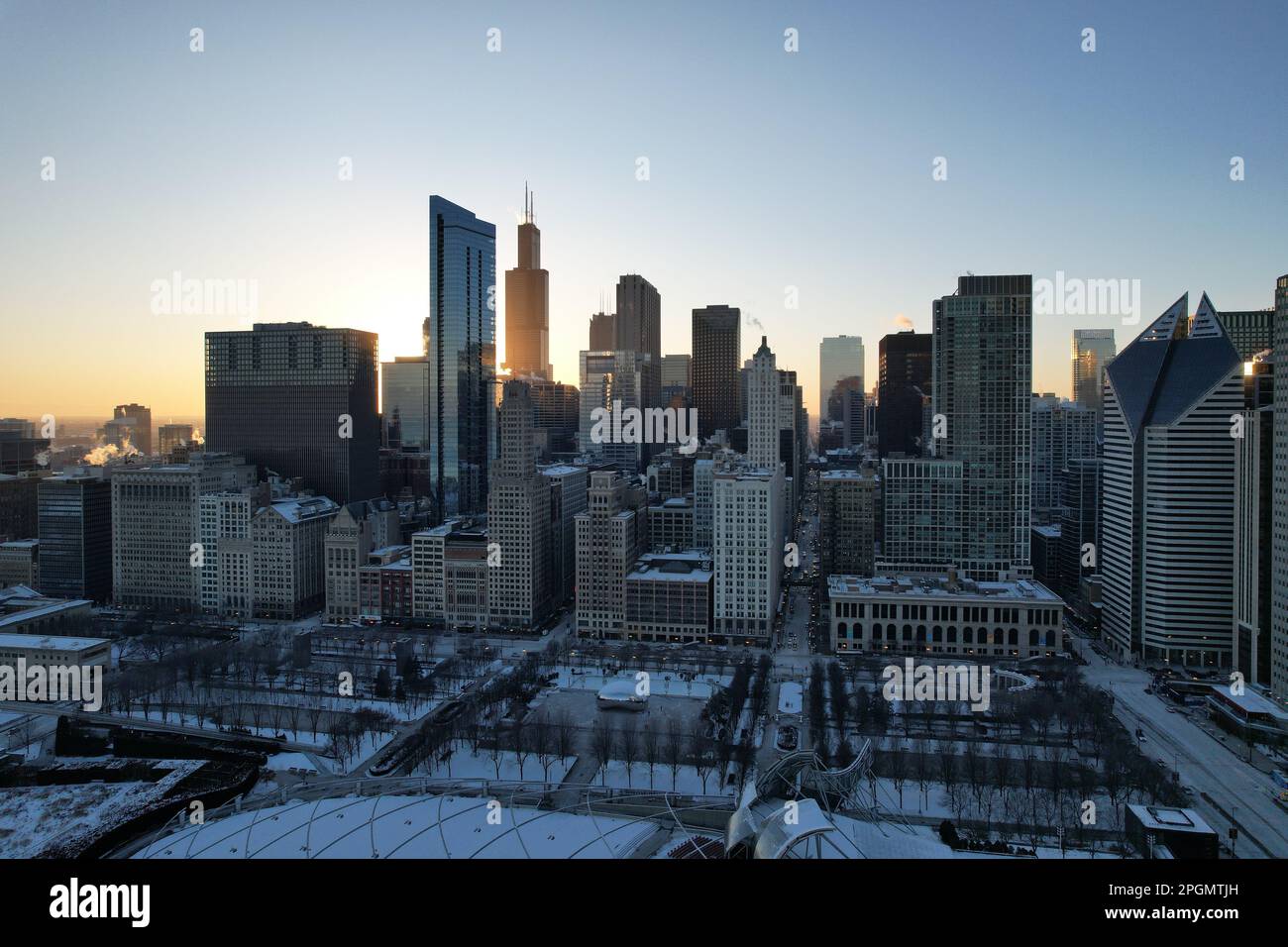 Aerial view of Chicago at night, showcasing the illuminated skyline of ...