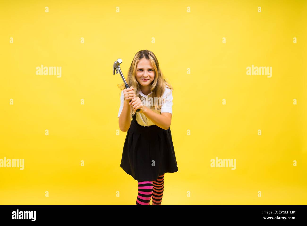 Future engineer. happy kid use a hammer repairing tool. building ...