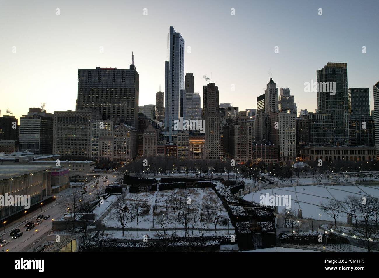 Aerial view of Chicago at night, showcasing the illuminated skyline of ...