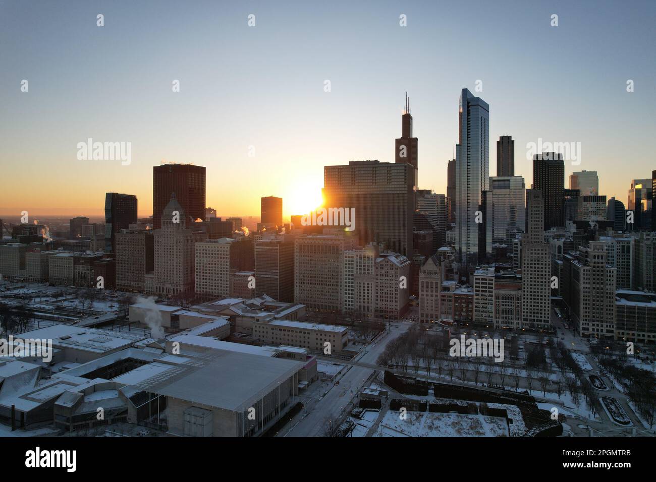 Aerial view of Chicago at night, showcasing the illuminated skyline of ...
