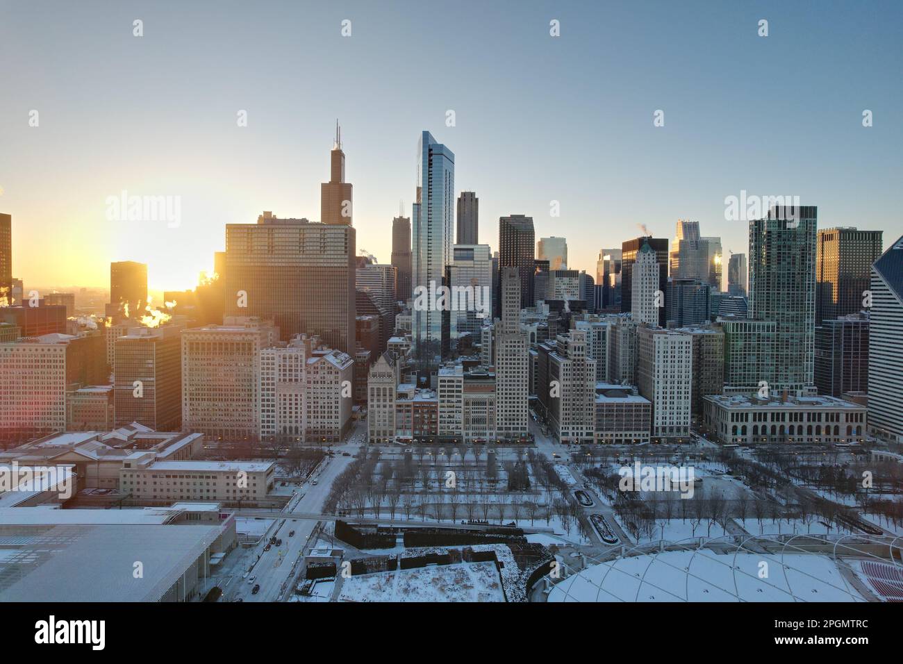 Aerial view of Chicago at night, showcasing the illuminated skyline of ...