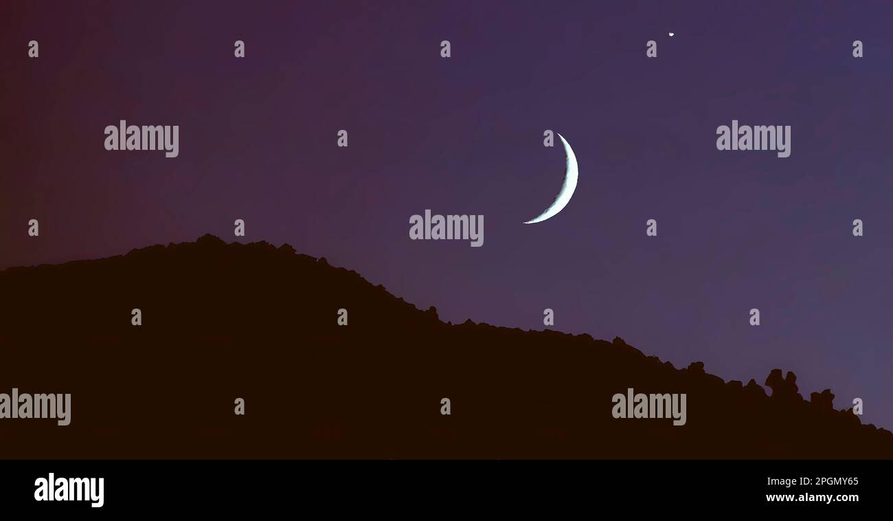 Crescent moon and Jupiter iewed from Vermont valley floor Stock Photo ...