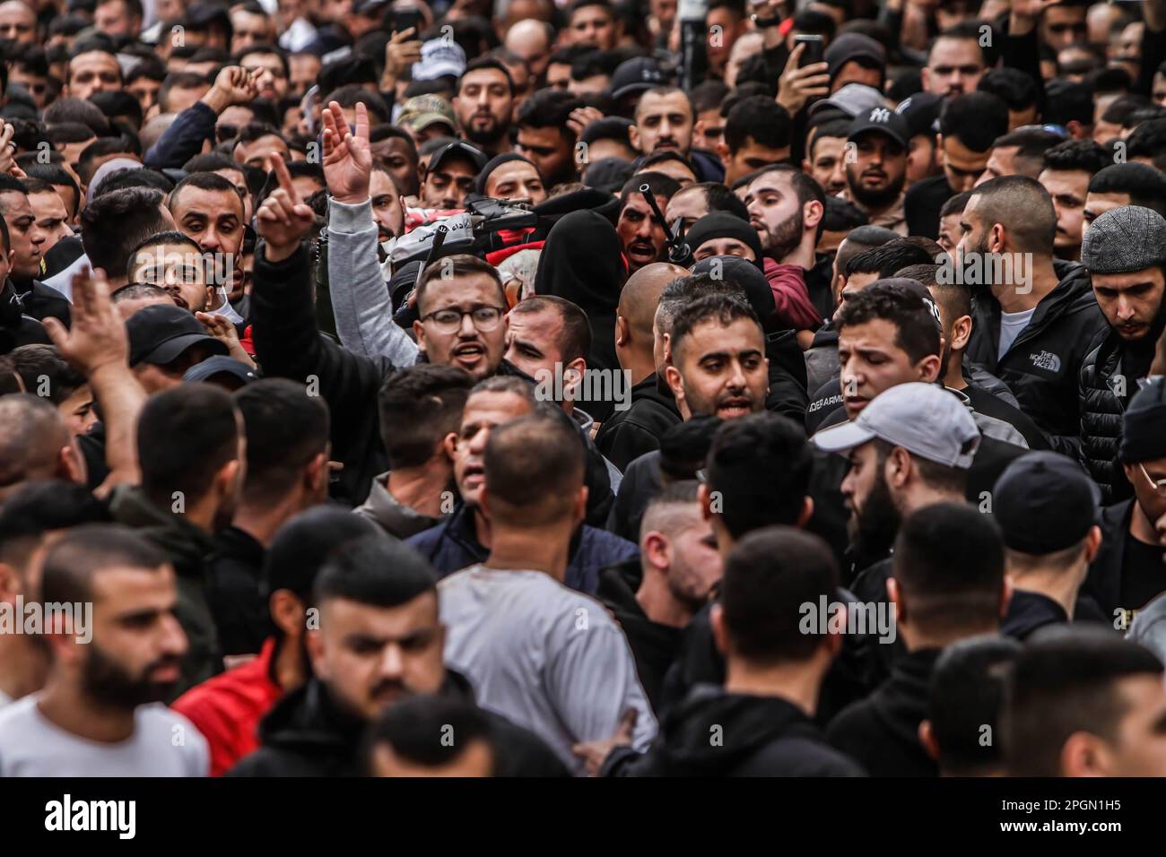Tulkarem, Palestine. 23rd Mar, 2023. Mourners carry the body of the ...