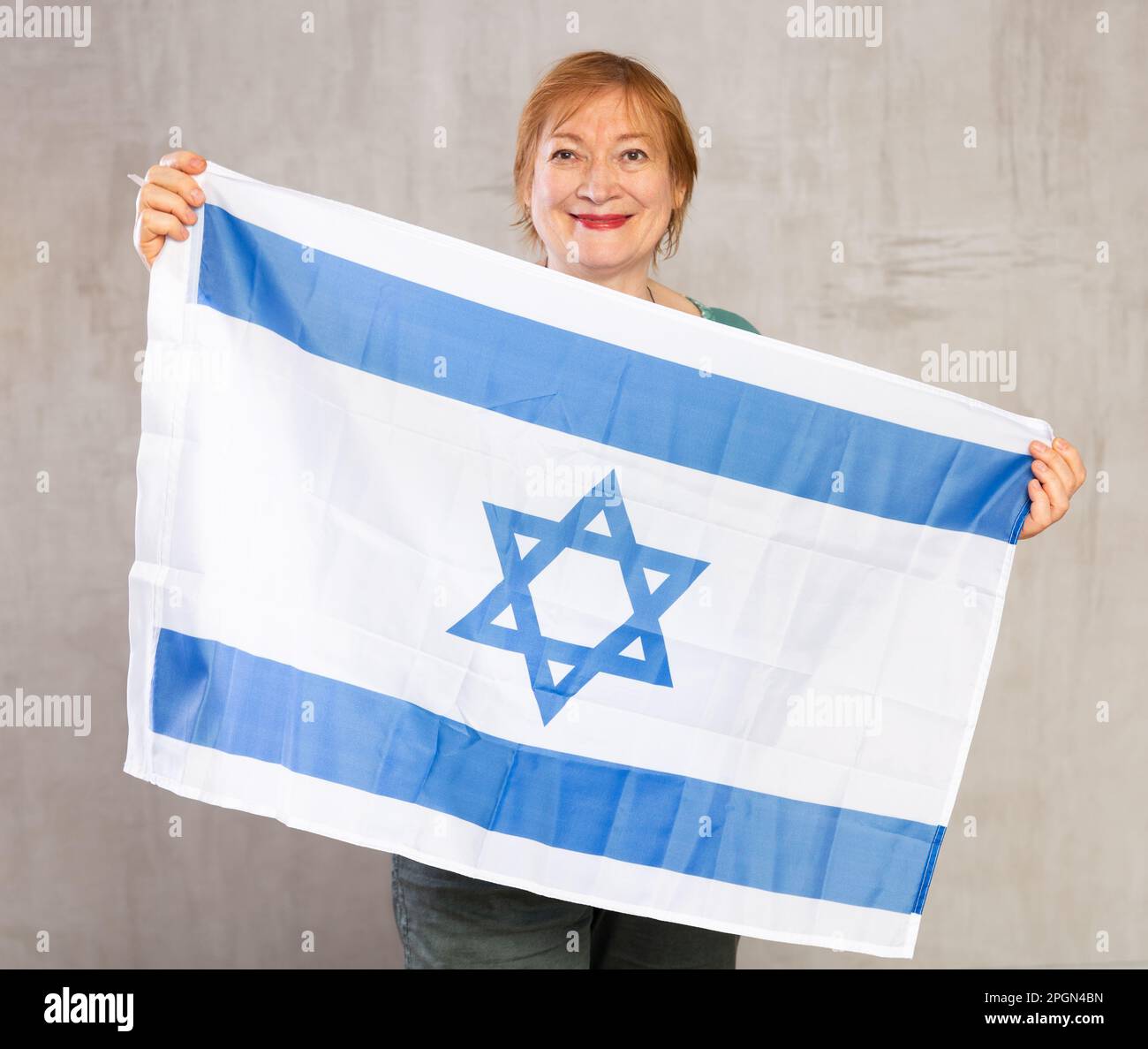 Woman waving israeli flag hi-res stock photography and images - Alamy
