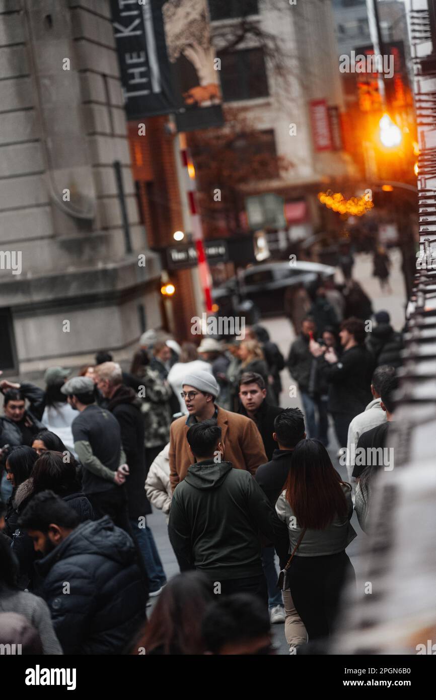 Pedestrians walk along lively street hi-res stock photography and images - Alamy