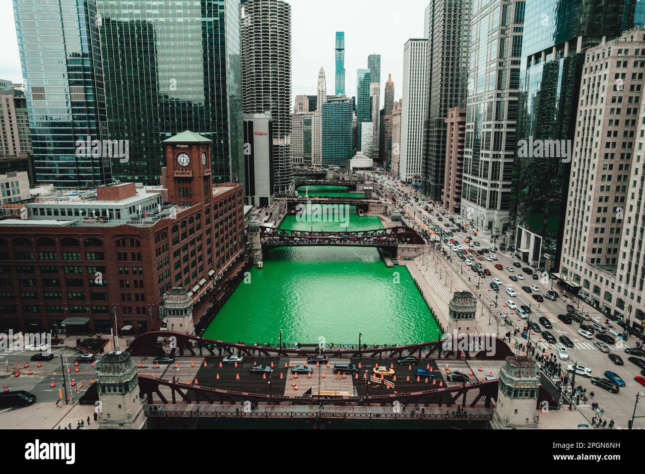 A breathtaking view of the Chicago river in its vibrant emerald hue ...
