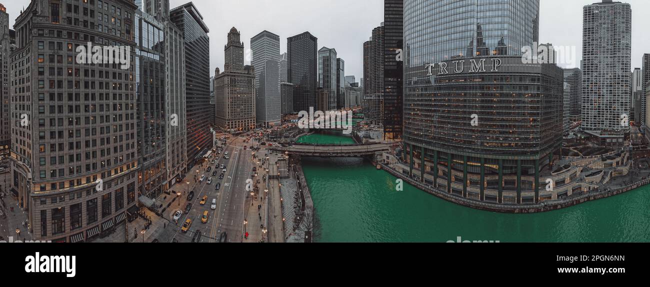A breathtaking view of the Chicago river in its vibrant emerald hue ...