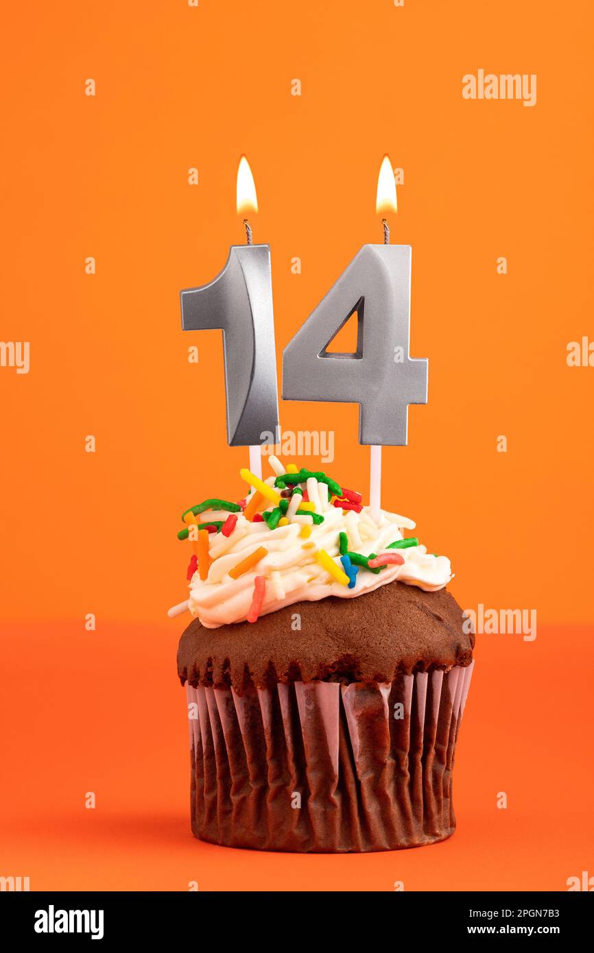 Birthday cake with candle number 14 - Orange foamy background Stock ...