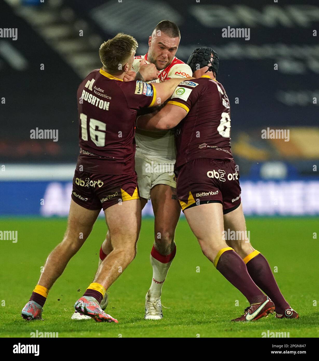 St Helens' Curtis Sironen is tackled by Huddersfield Giants' Harry ...