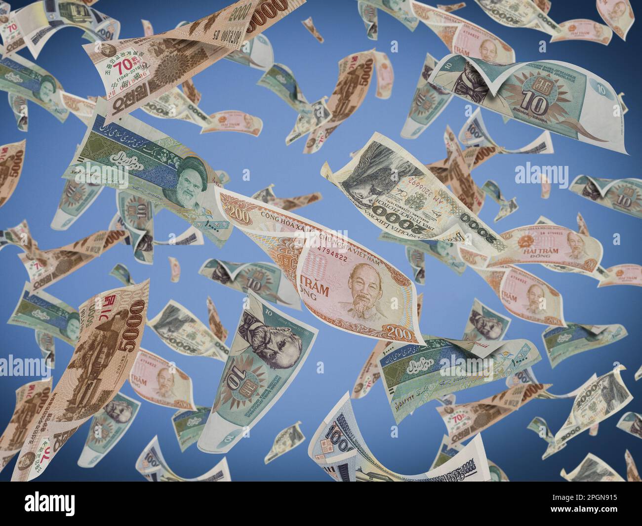 A pile of different international currency bills are seen floating in ...