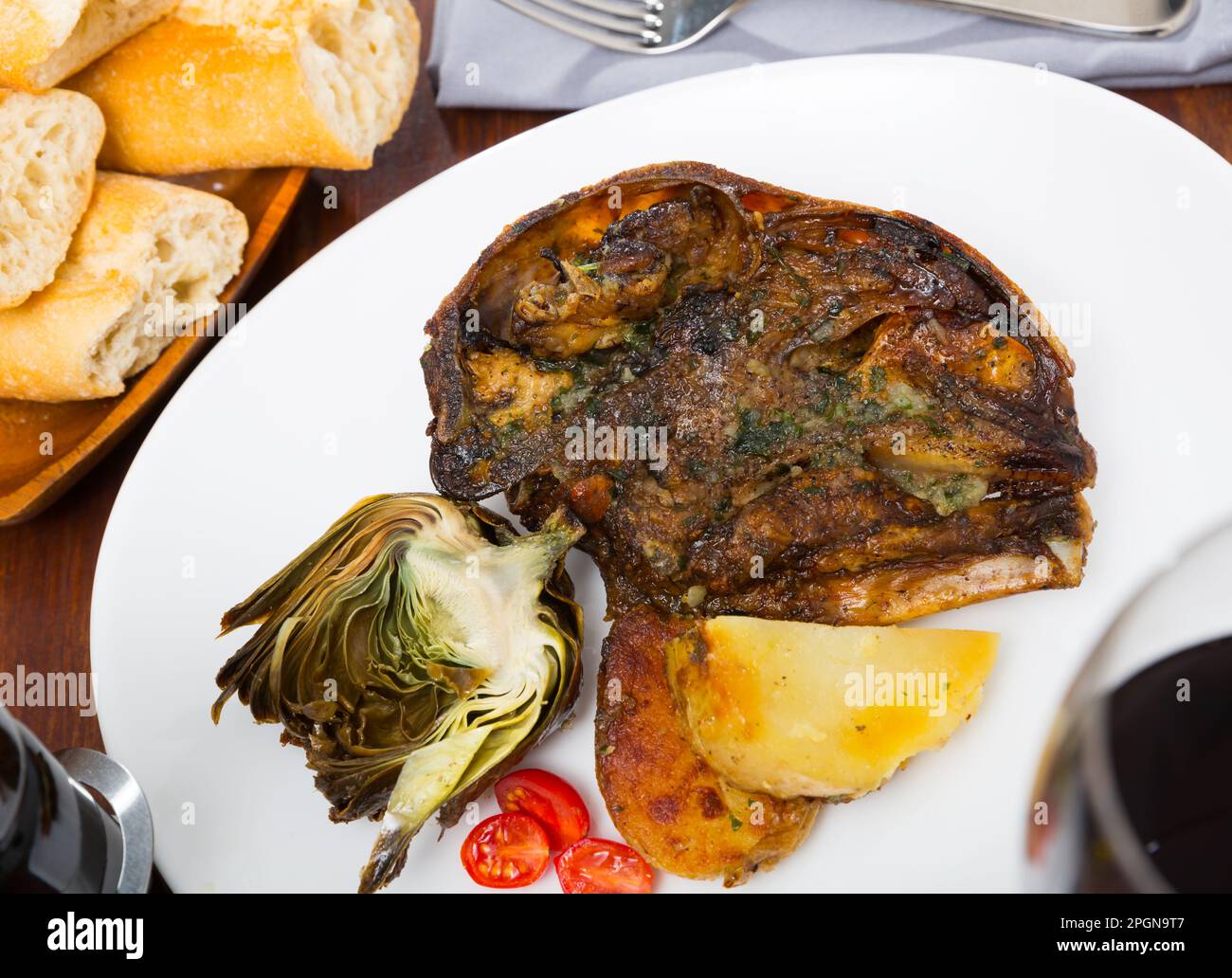 Baked head of lamb Stock Photo - Alamy