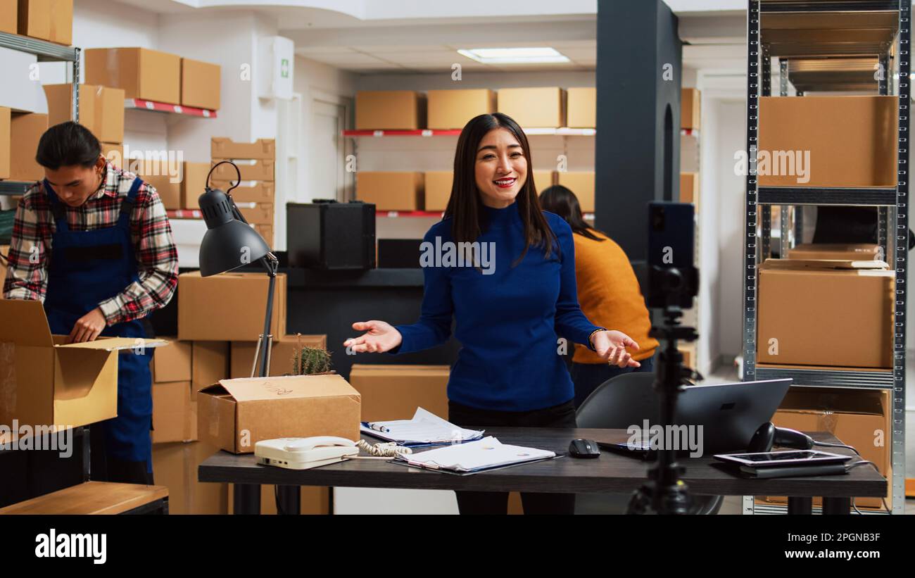 Group of employees recording online promotion vlog, filming marketing ...