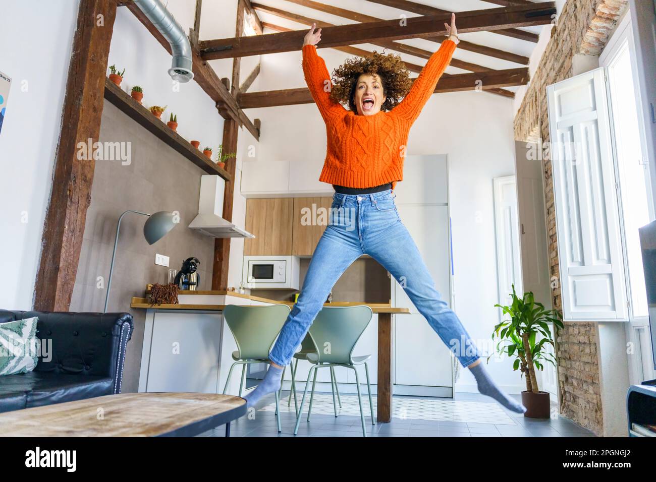 Jumping at home hi-res stock photography and images - Alamy
