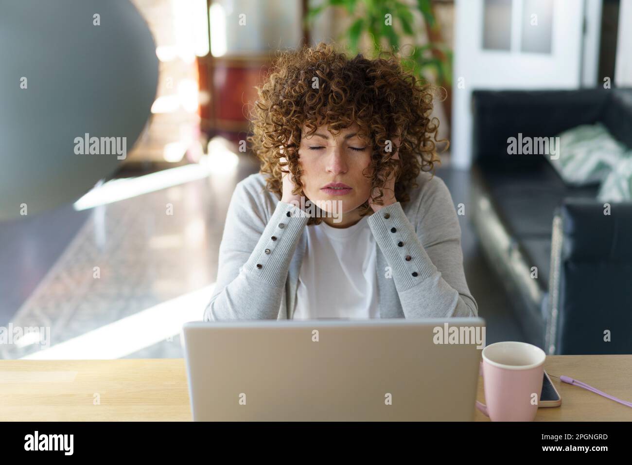 Sitting with hands over his eyes hi-res stock photography and images ...