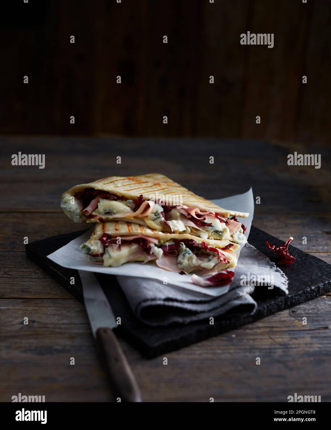 Studio shot of ready-to-eat piadina romagnola flatbread sandwich Stock ...