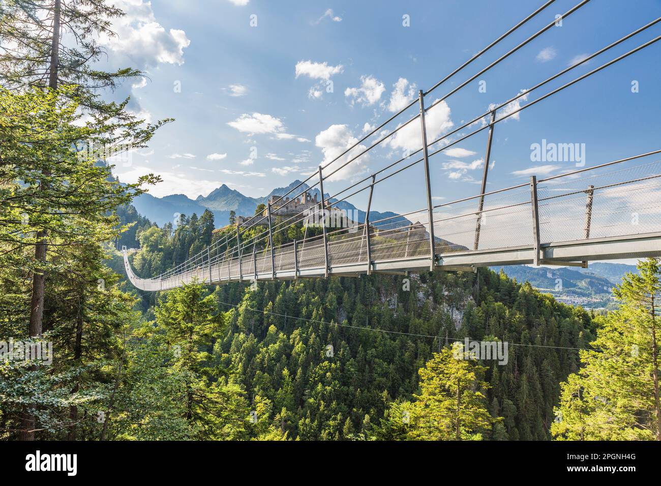 Suspension bridge spanning against ehrenberg castle hi-res stock ...