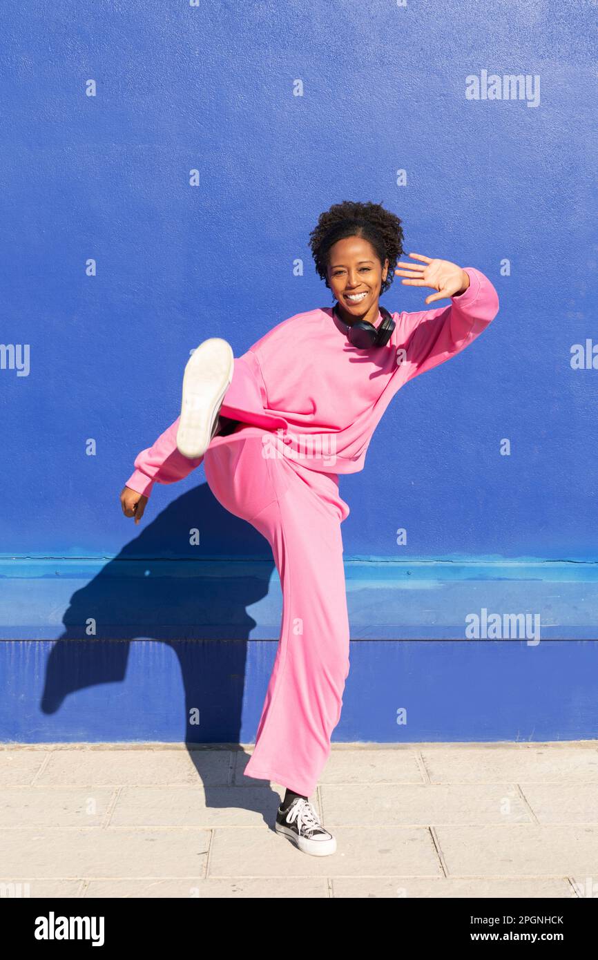 Woman kicking camera hi-res stock photography and images - Alamy