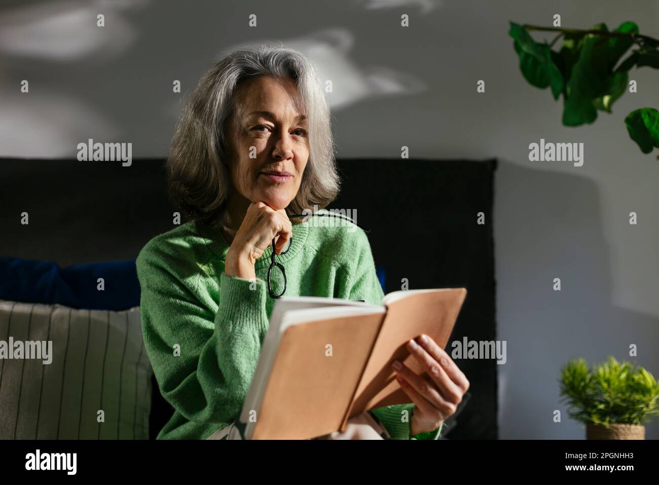 Mature woman in bedroom hi-res stock photography and images - Alamy