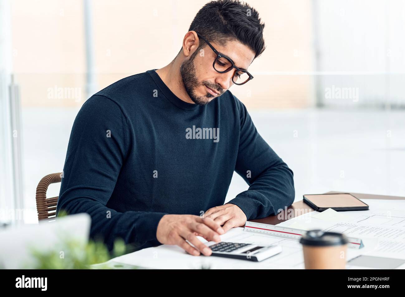 Desk and calculator hi-res stock photography and images - Alamy