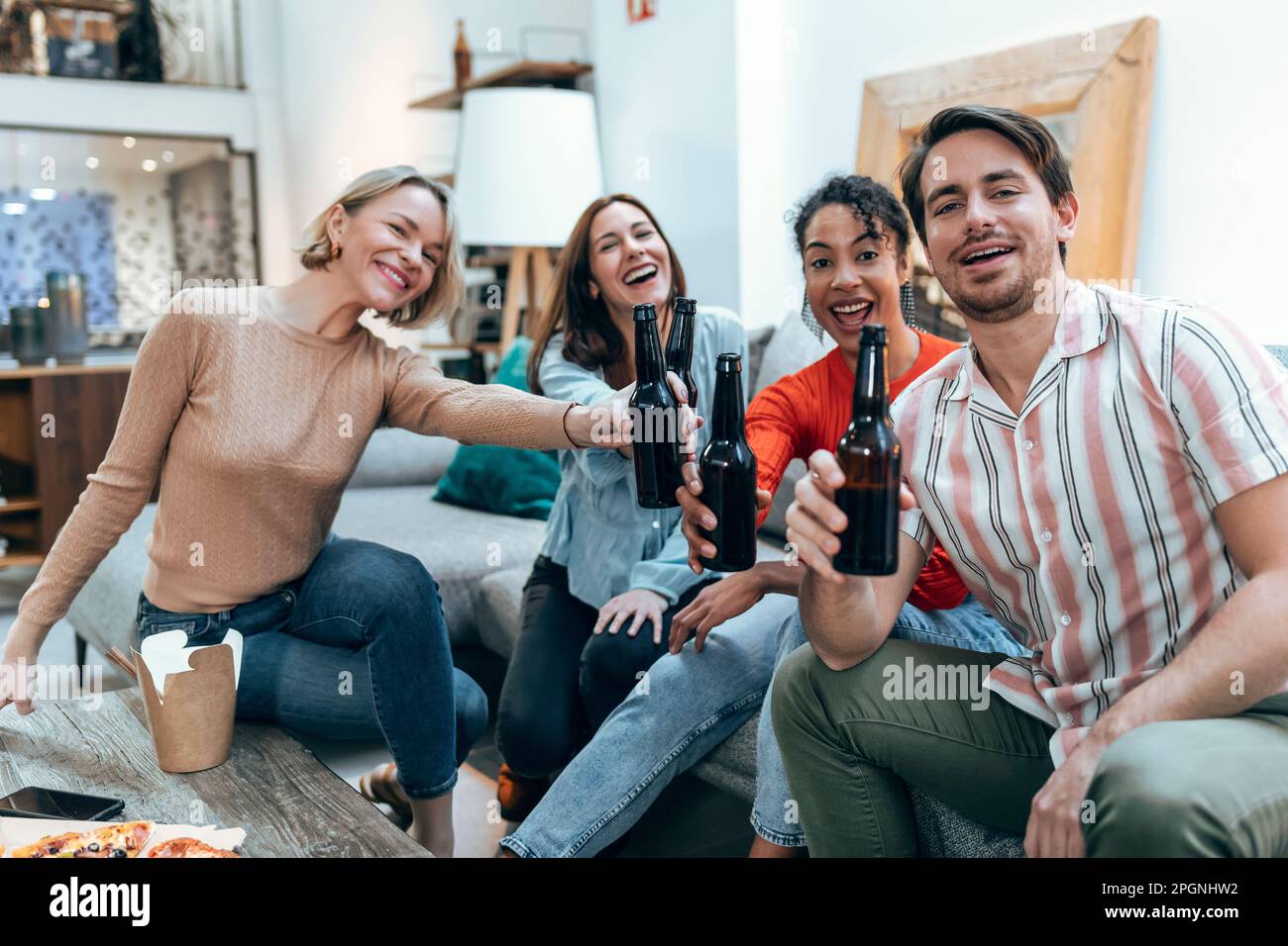 Multiracial coworkers having fun at workplace Stock Photo - Alamy