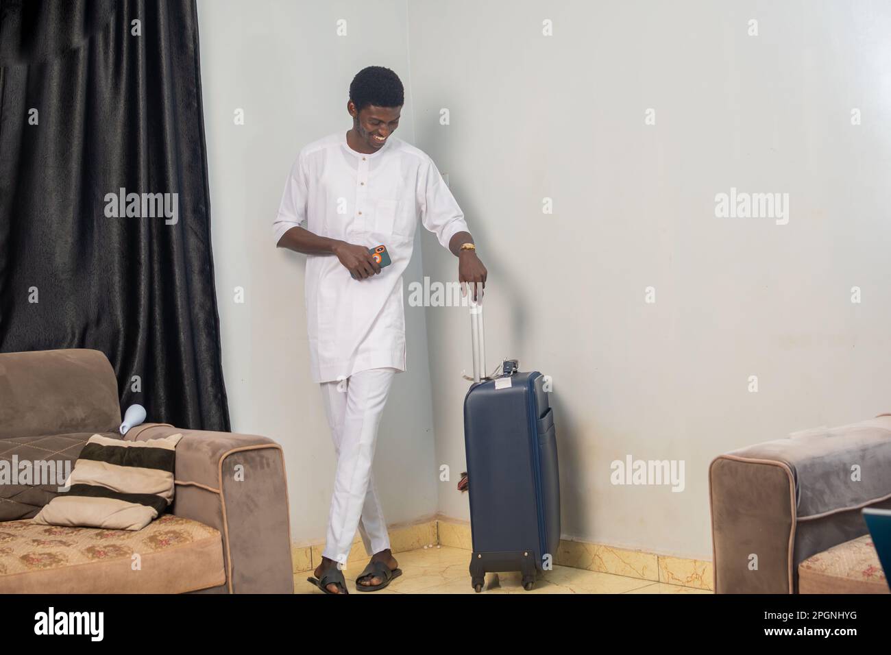 Man entering hotel hi-res stock photography and images - Alamy