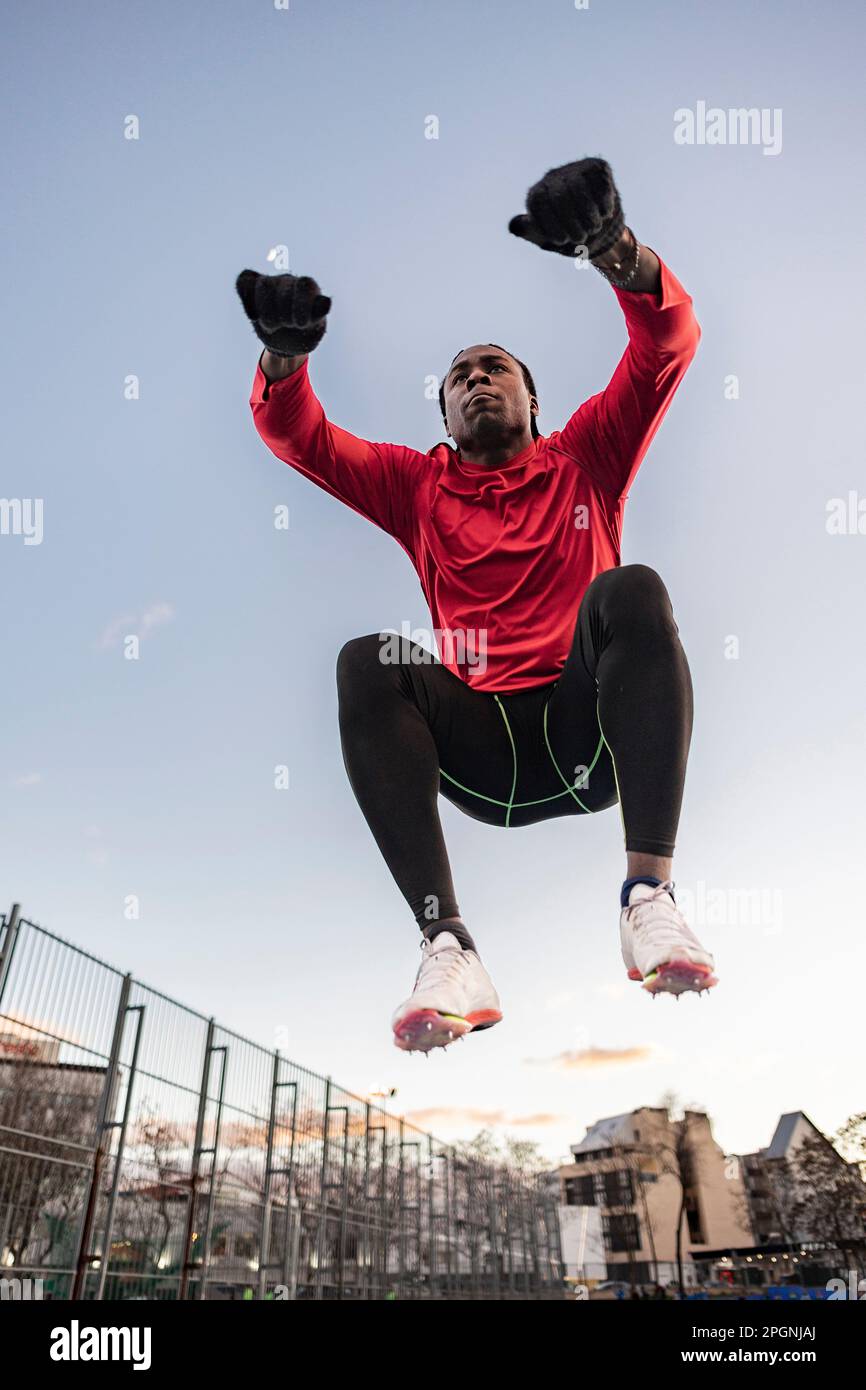 Man doing jumping squats hi-res stock photography and images - Alamy