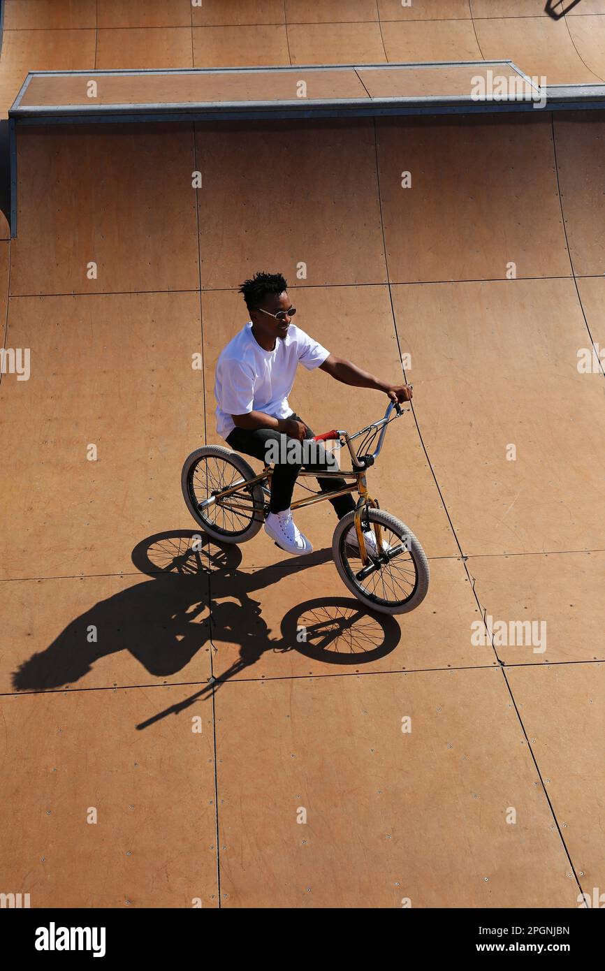 Young man sitting on bmx hi-res stock photography and images - Alamy