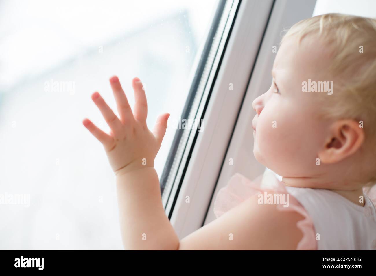 The baby meets dad at the window. The danger of falling out of a window ...