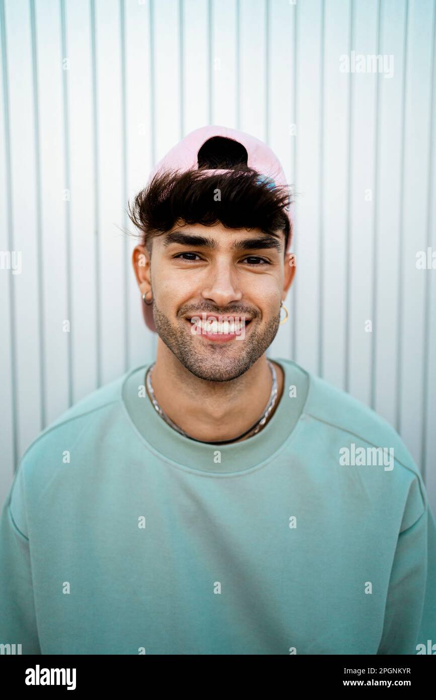 Man in white cap hi-res stock photography and images - Alamy