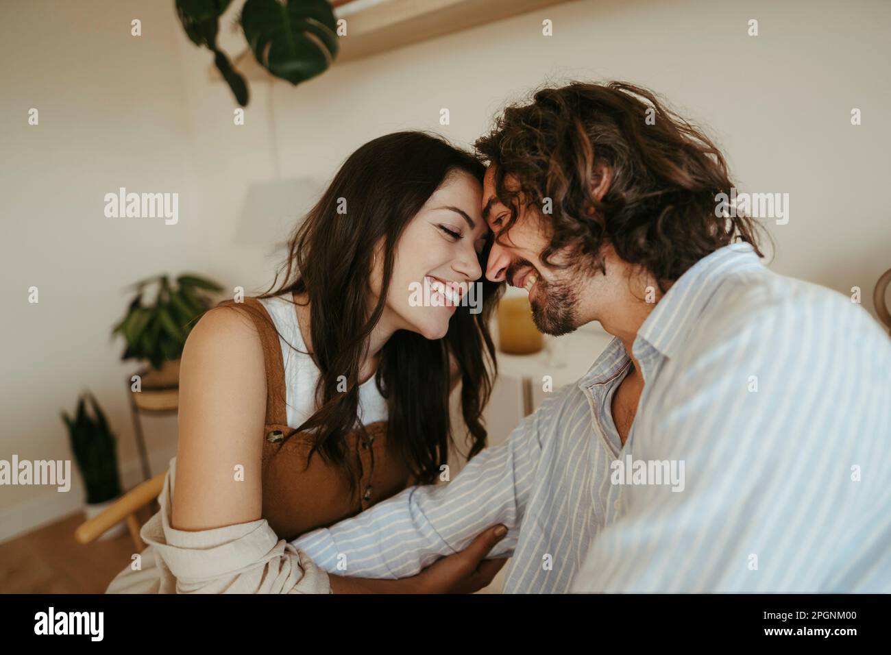 Man and woman foreheads touching hi-res stock photography and images ...