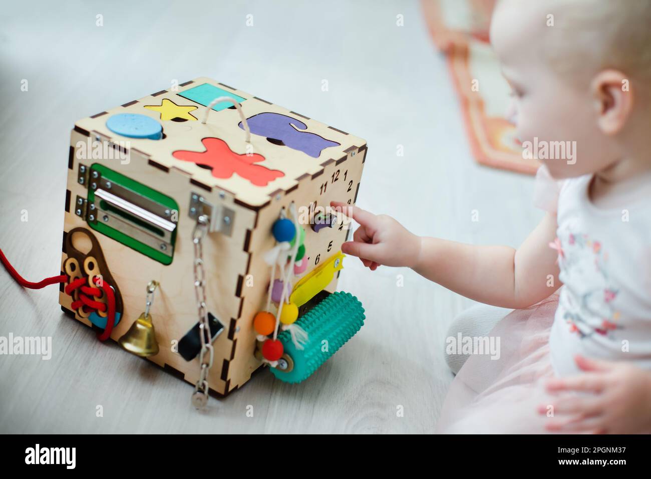 Montessori Sensory Toy for Fine Motor Skills. Baby learns numbers on a ...