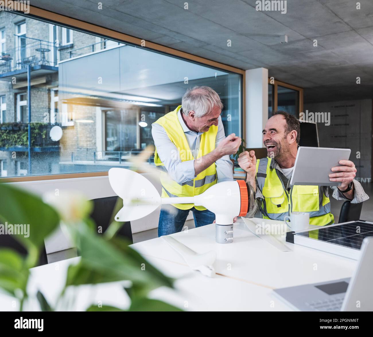Office colleague laughing positive energy hi-res stock photography and ...