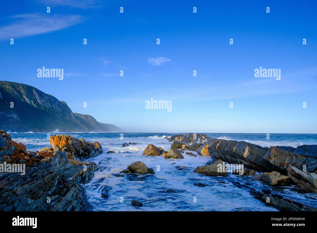 South Africa, Eastern Cape, Rugged bank of Storms River in Tsitsikamma ...