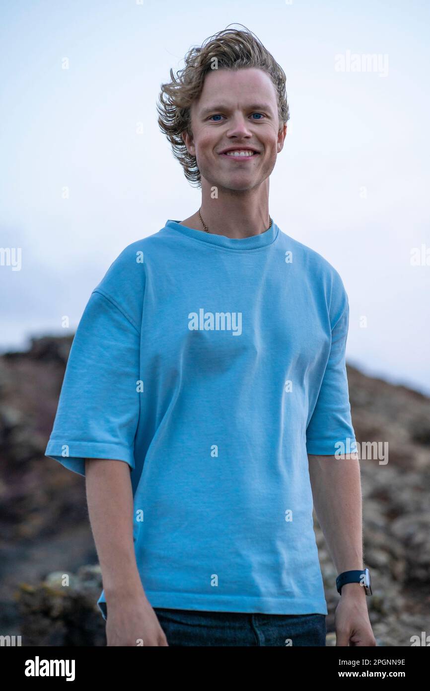 Wearing blue t shirt hi-res stock photography and images - Alamy