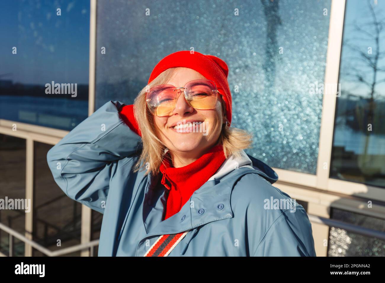 Woman smiling sunglasses on head hi-res stock photography and images ...