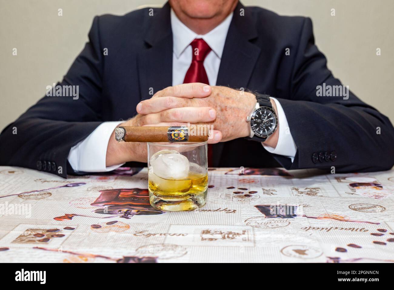 Caucasian elegant man in suit and tie with whiskey and cigar Stock ...