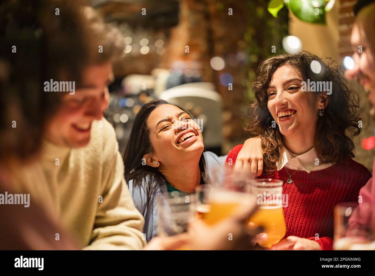 Female friends having fun restaurant hi-res stock photography and ...
