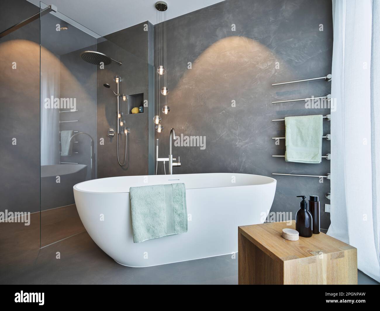 Empty bath tub arranged in bathroom of modern apartment Stock Photo - Alamy