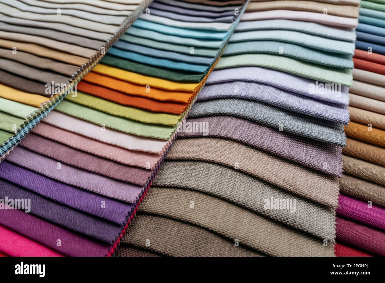 Multi colored fabric samples arranged in row Stock Photo - Alamy
