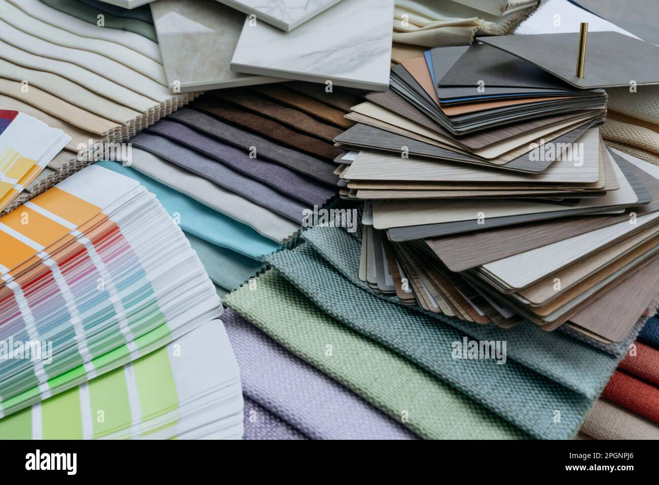 Variety of fabric color samples arranged together Stock Photo - Alamy